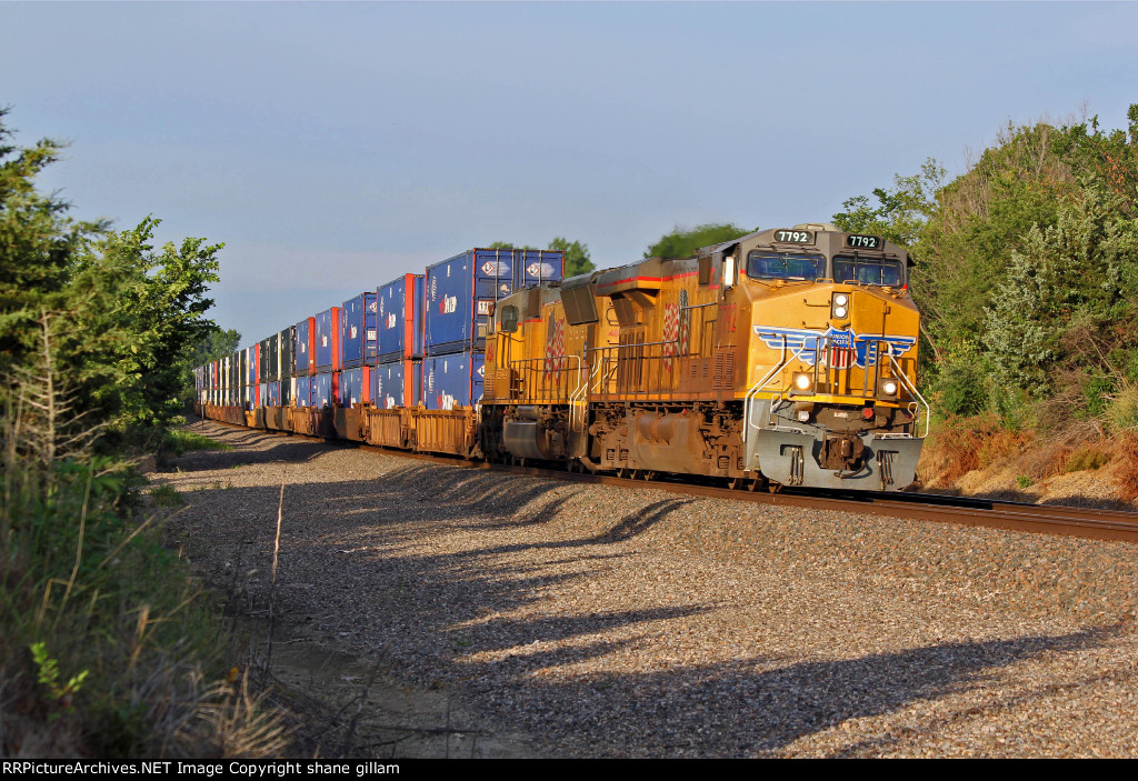 UP 7792 Rock's a EB stacker into the Sun!!
